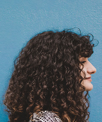 How to Avoid Pyramid Head, According to Top Curl Stylists | NaturallyCurly